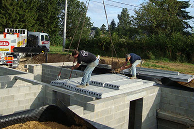 Service de placement de hourdis, prédalles et citernes d’eau